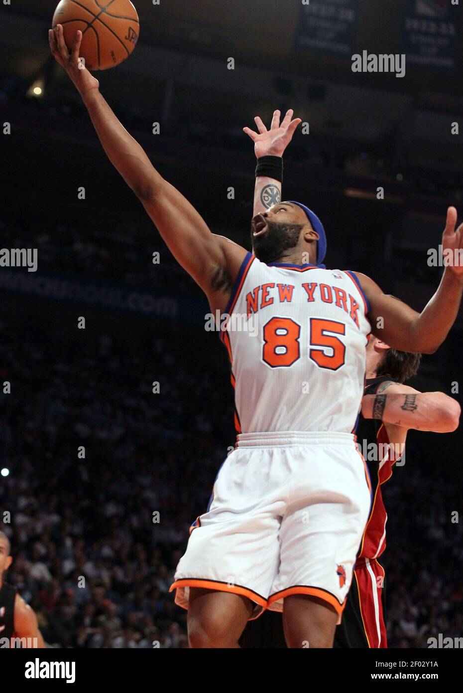 Baron Davis of the New York Knicks lays up a basket against the Miami ...