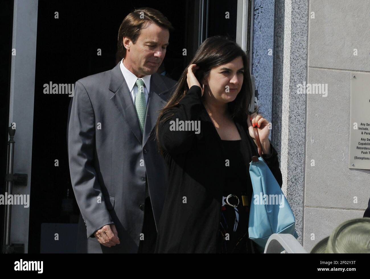 Former Sen. John Edwards and his daughter, Cate Edwards, leave the ...