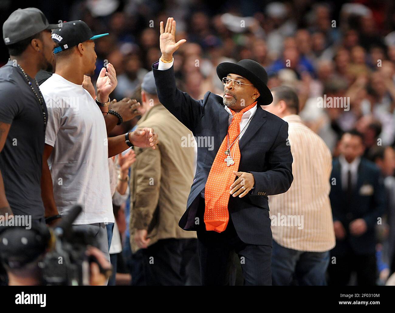 Filmmaker and New York Knicks super-fan Spike Lee looks for high-fives ...