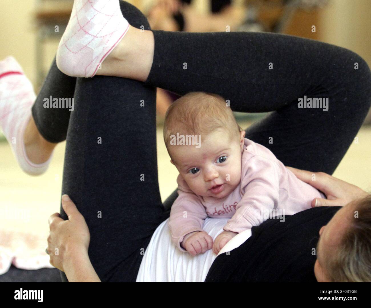 Only 7 weeks old, Adeline keeps an eye on her mother Ericka Lindsay ...
