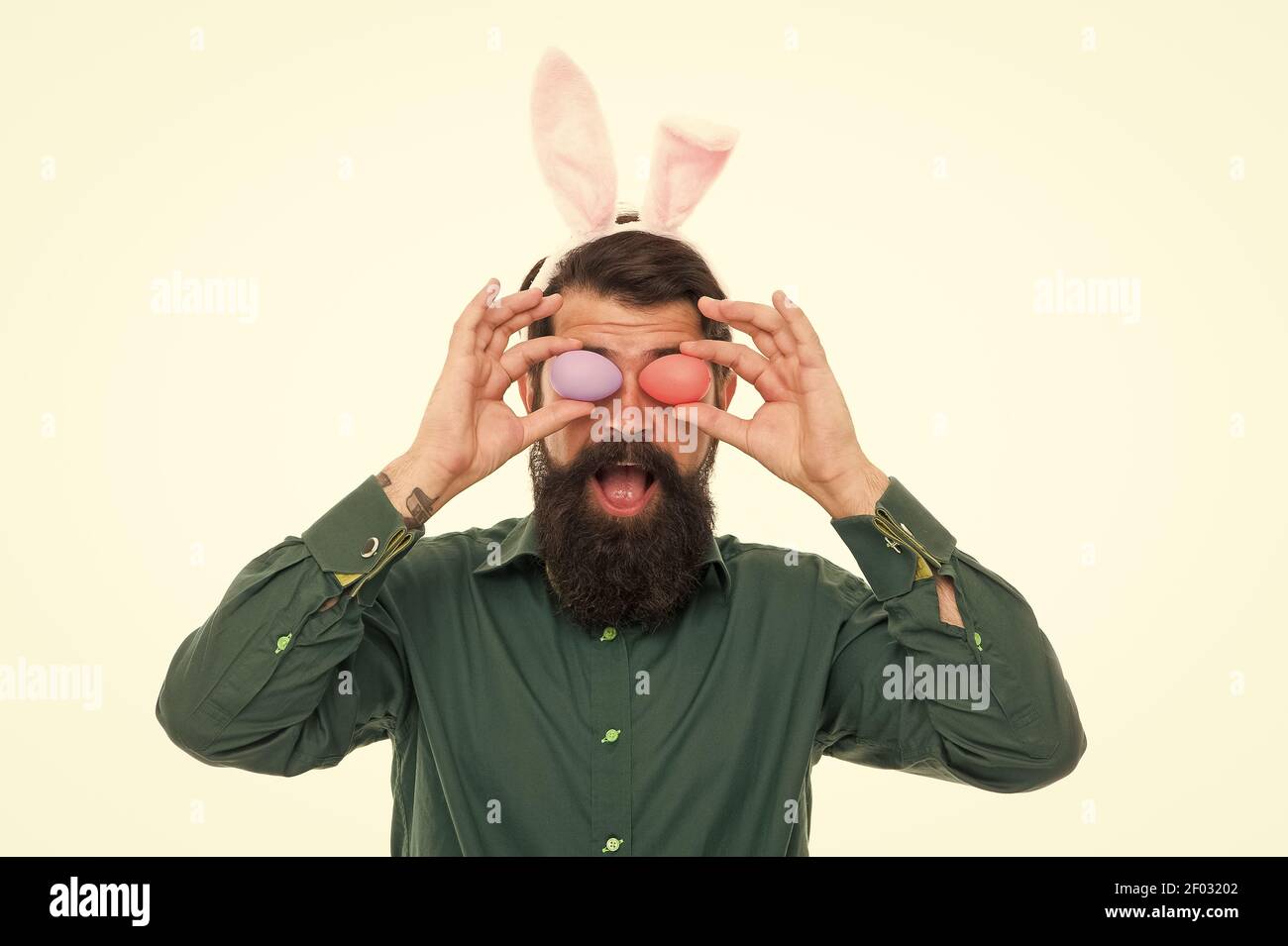 Mr bunny hop. Hipster hold eggs as glasses. Easter bunny bringing eggs ...
