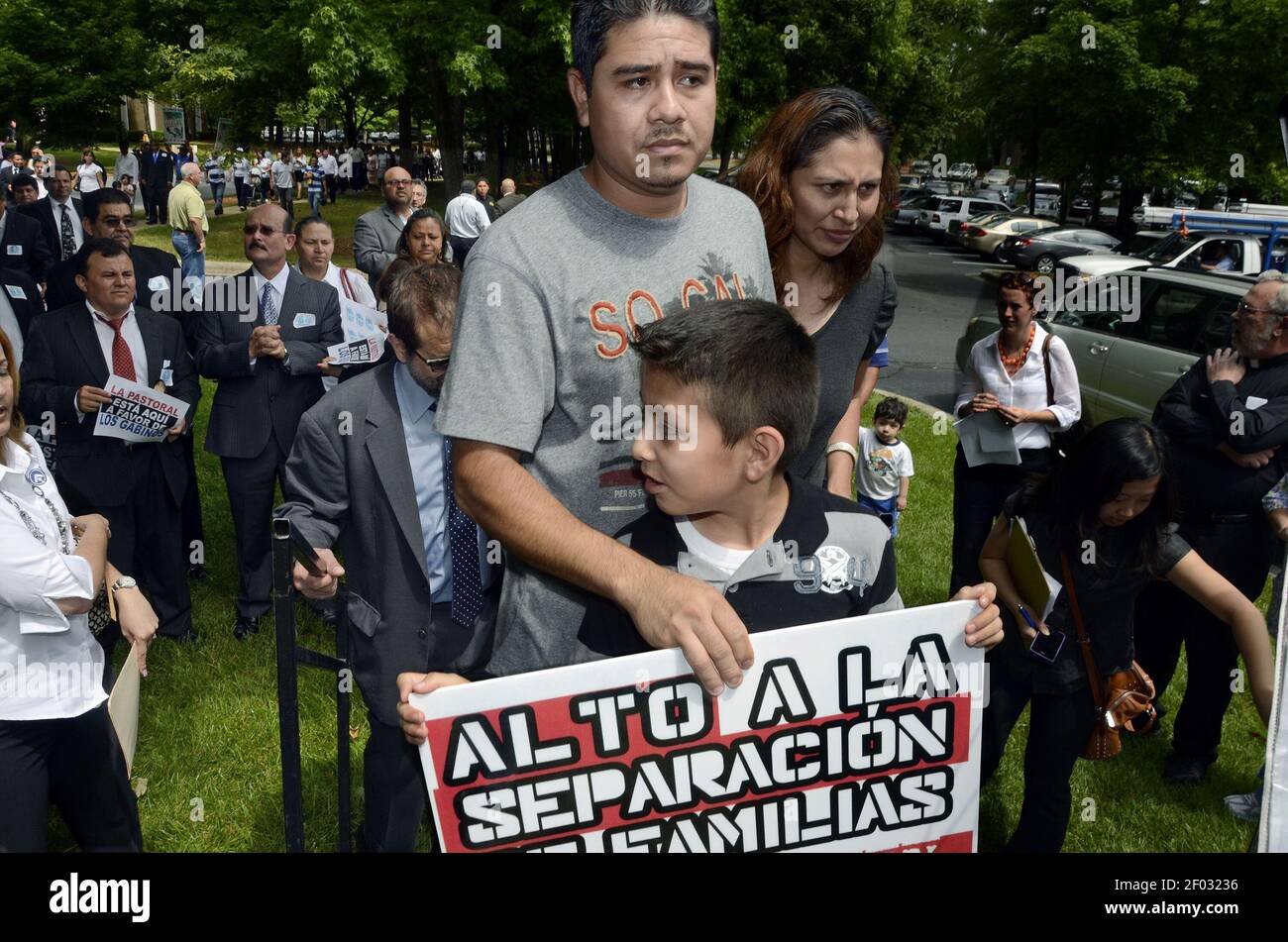Gabino Sanchez with his son Roger Sanchez and wife Laura, right, march ...