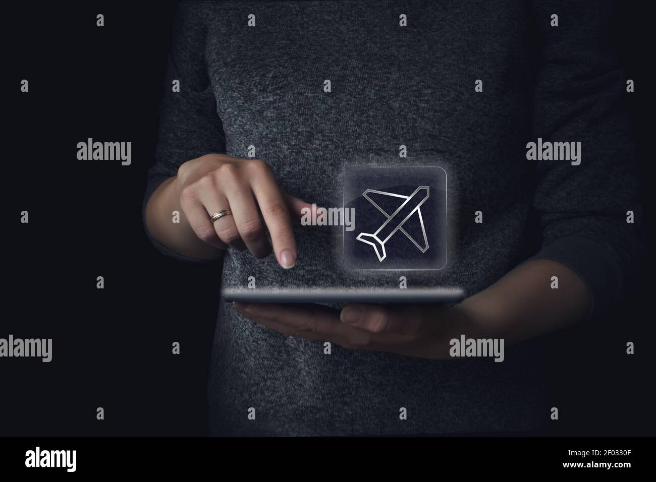 Hand Touching Screen On Tablet Pc with Hologram Icon Plane. Travel ...