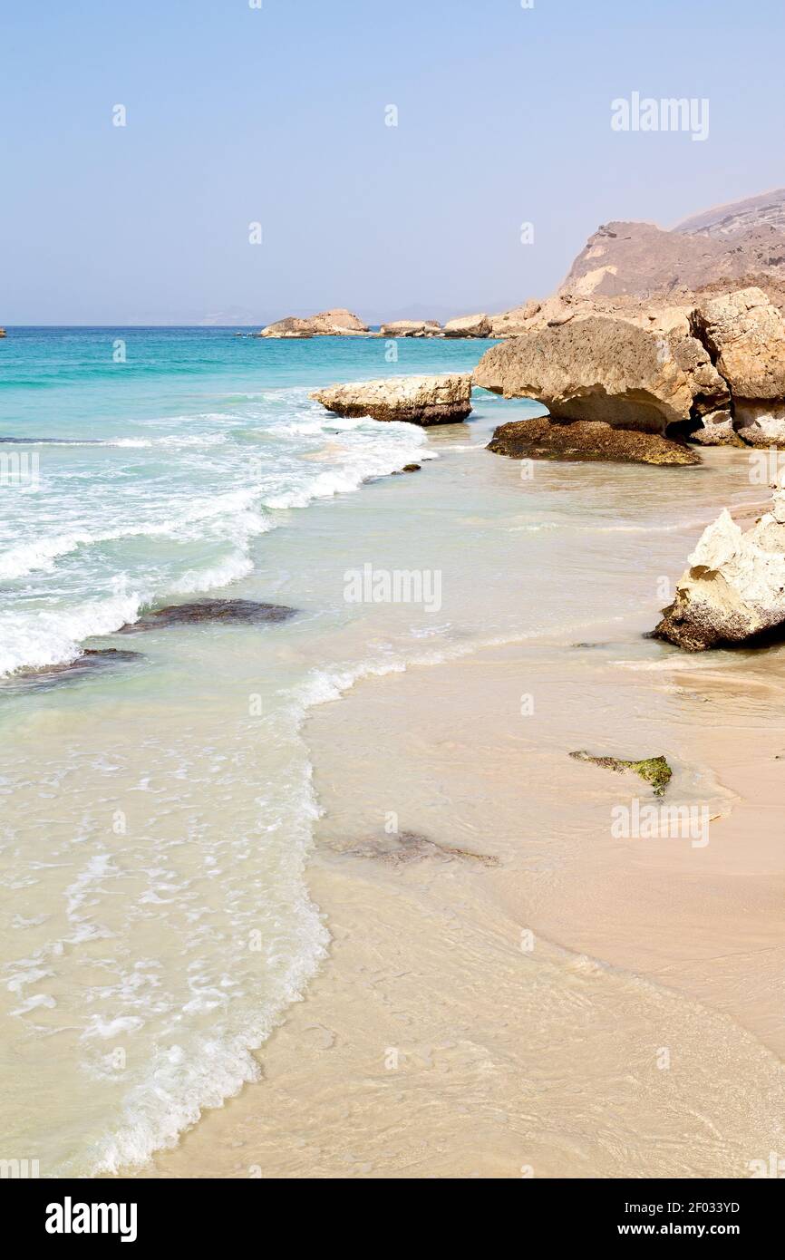 In oman coastline sea ocean gulf rock Stock Photo - Alamy