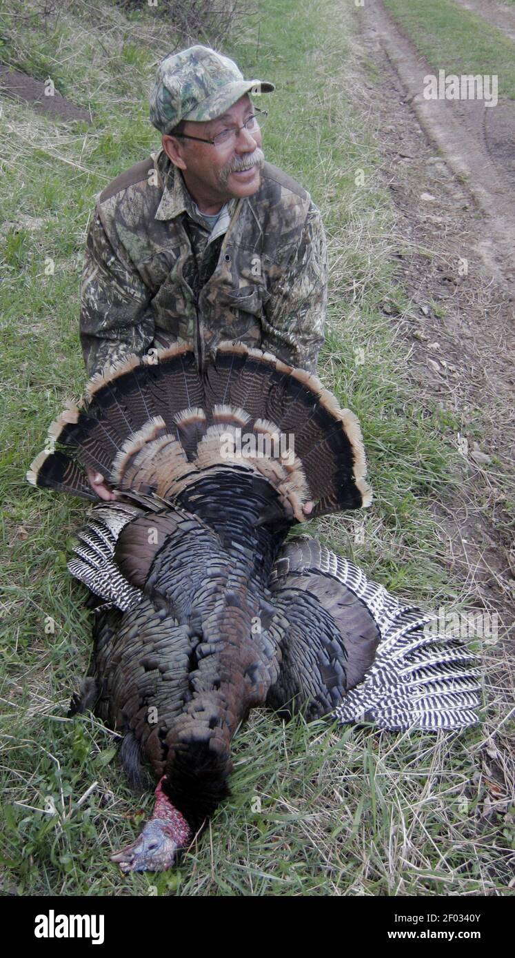 Tom Kalahar shows a turkey he bagged while hunting in the Black Hills ...