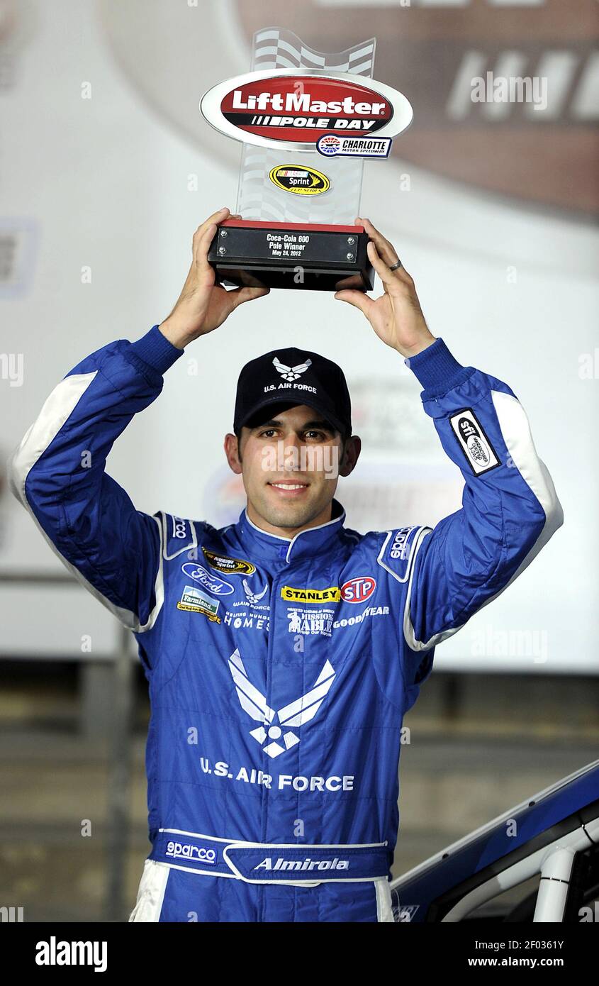 NASCAR Sprint Cup Series driver Aric Almirola celebrates his winning ...