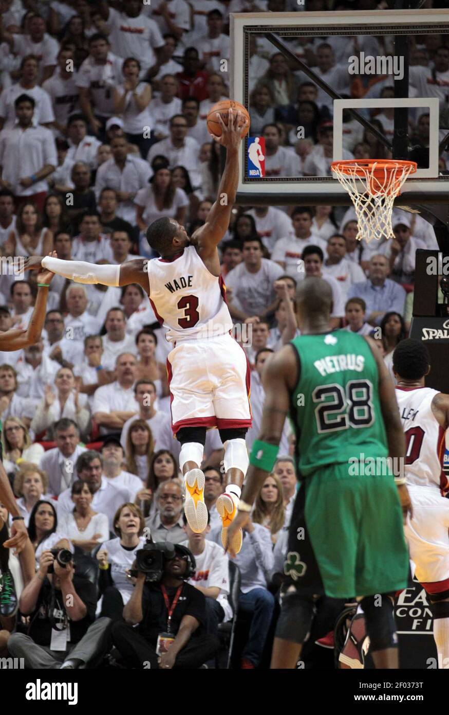 Dwyane Wade (3) of the Miami Heat dunks in overtime in Game 2 of the ...