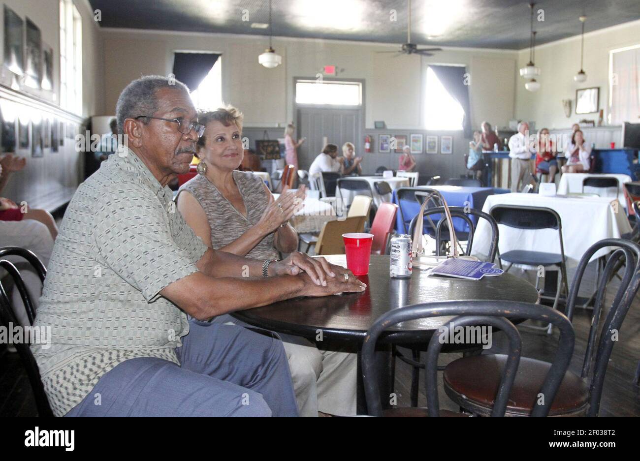 Leo Raboteau and Lucy Hazeur applaud the performance of Isaac "Guitar ...