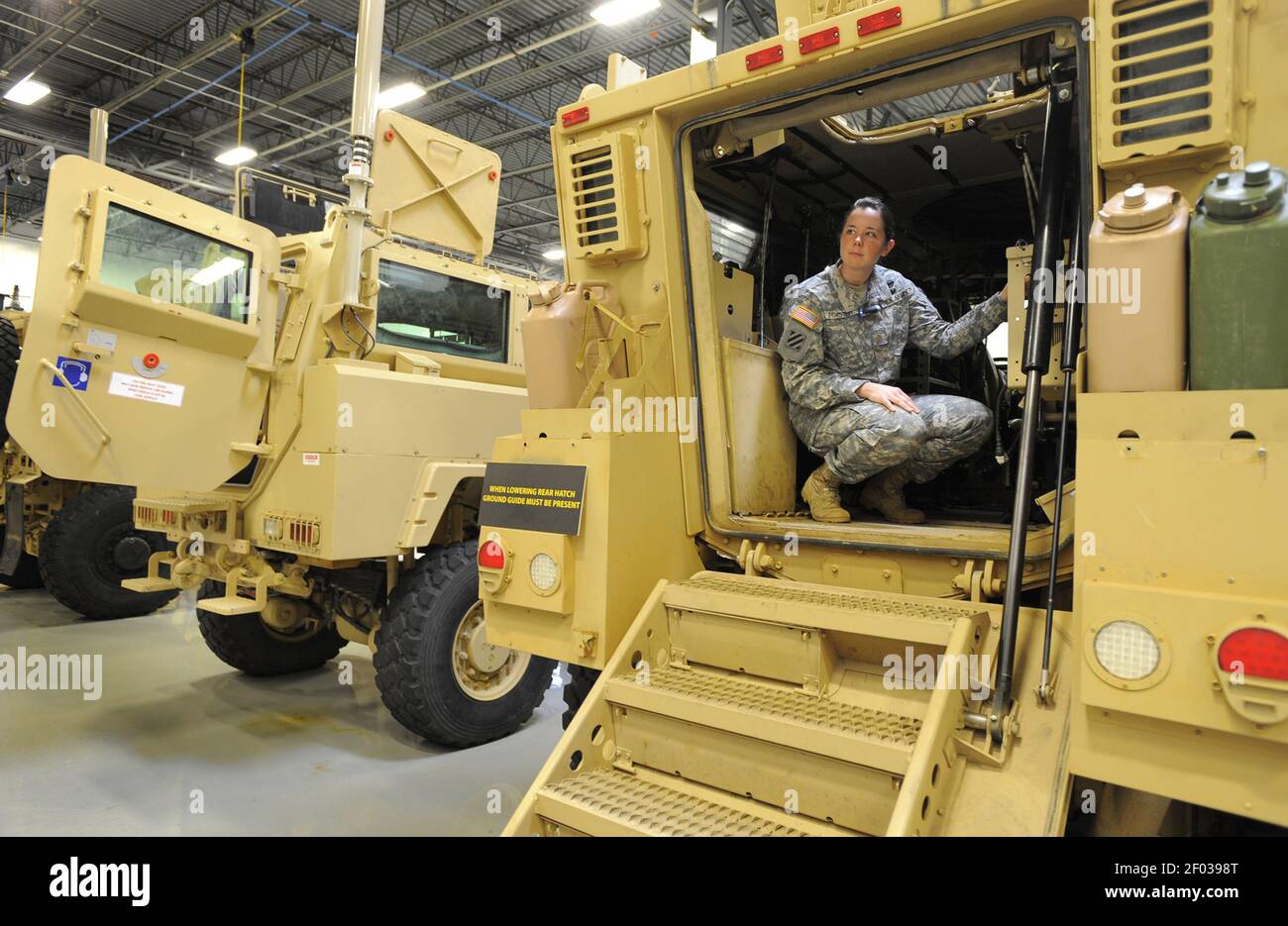 Maj. Sarah Forster shows a MaxPro vehicle that includes frequency ...
