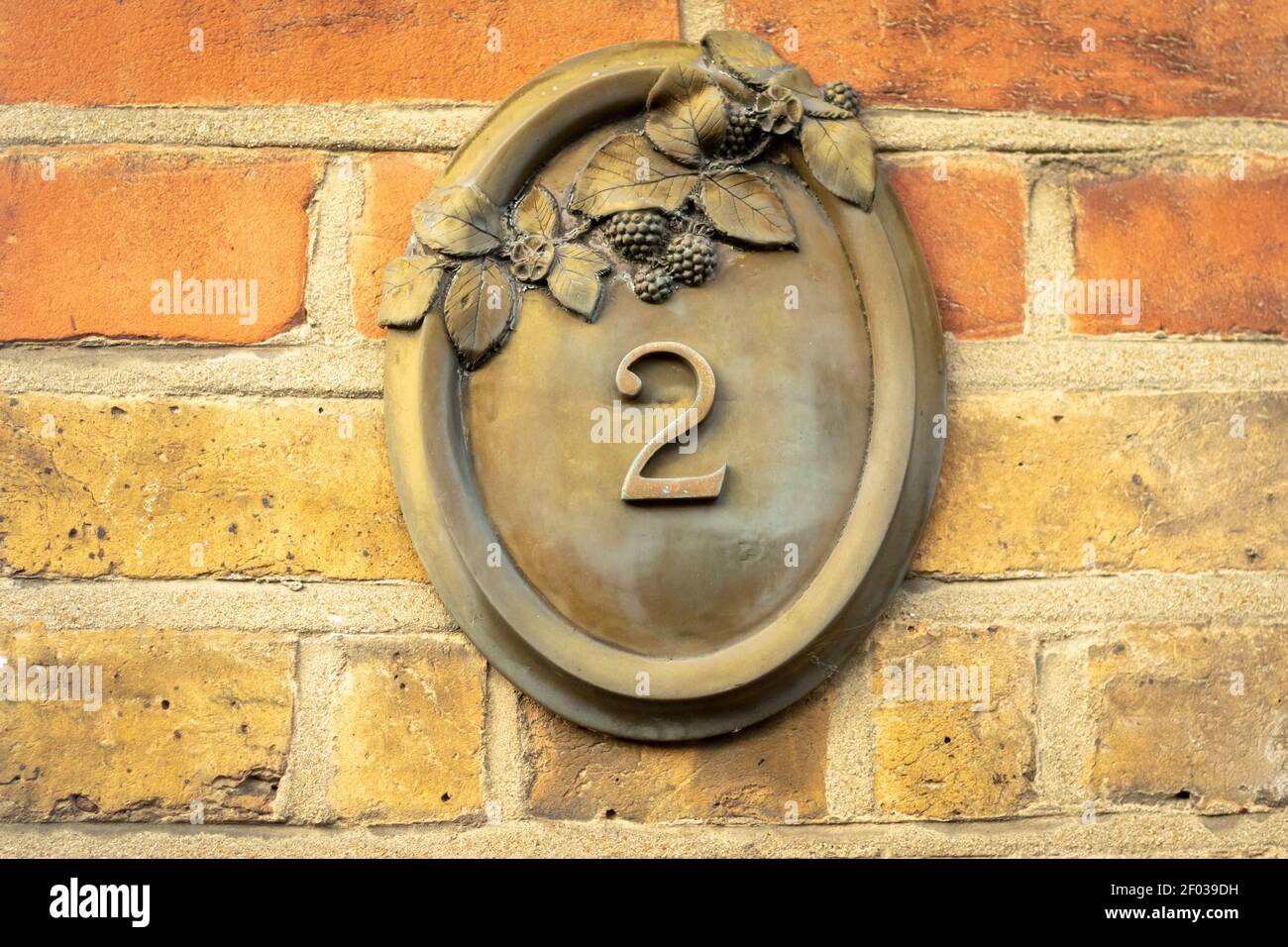 House number 2 with blackberries Stock Photo - Alamy
