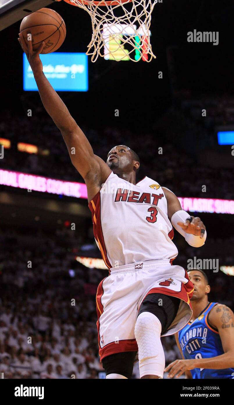 Miami Heat shooting guard Dwyane Wade (3) makes a layup against ...
