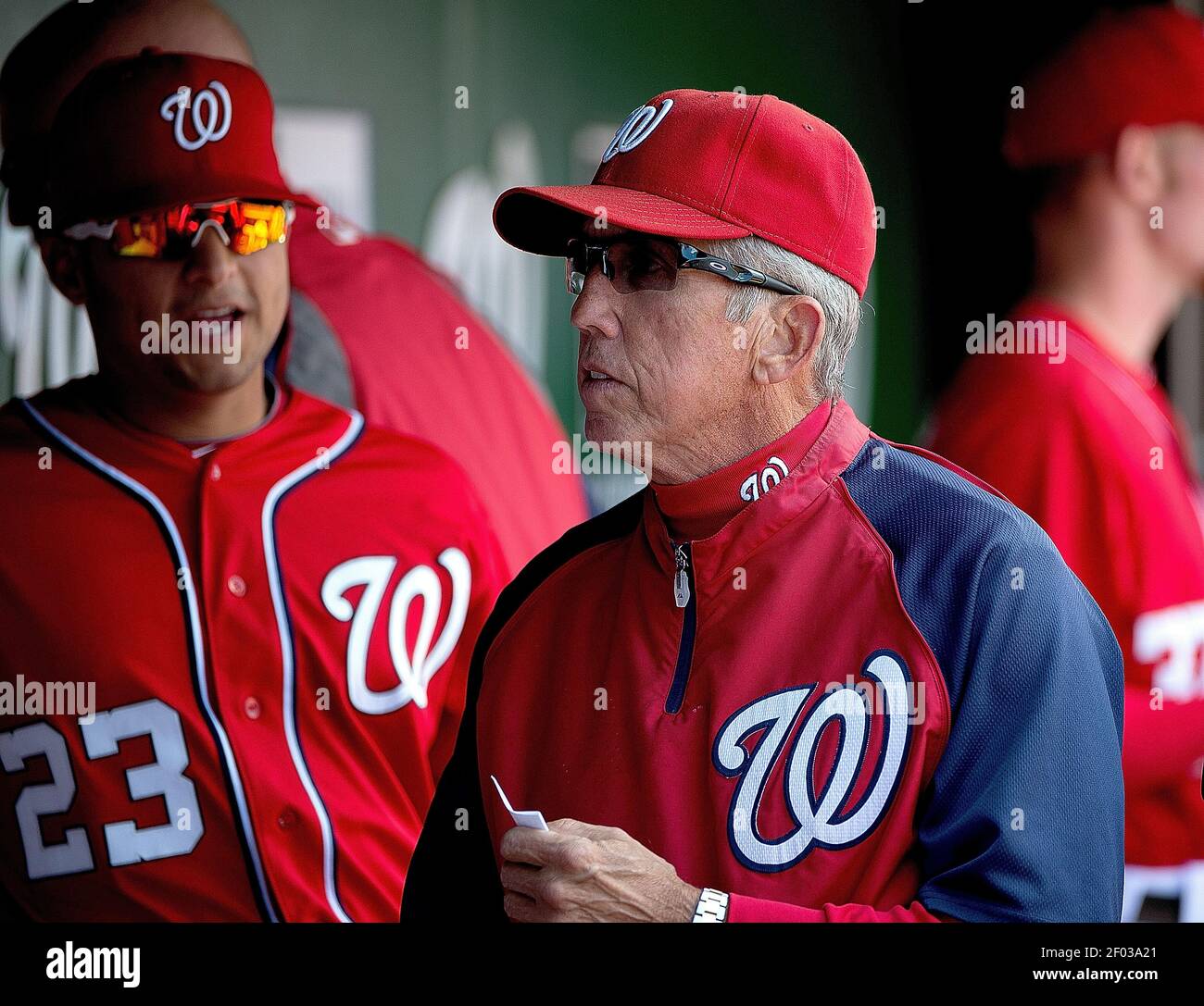 Washington Nationals manager Davey Johnson (5) talks to his team in the ...
