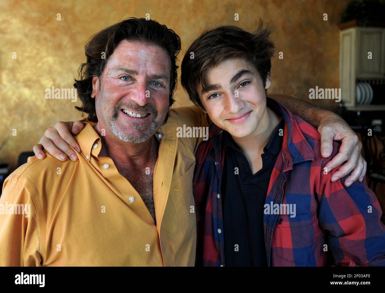 Ron Dash, left, with his son Sam Dash pose for portrait, June 13, 2012 ...
