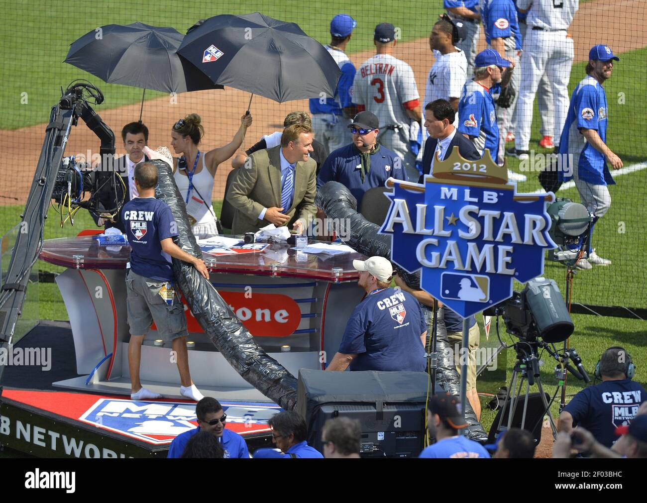 MLB Network broadcasters are kept cool during pre-game activites before ...