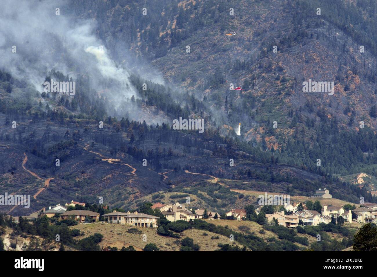 Helicopters make water drops on the The Waldo Canyon Fire in Colorado ...