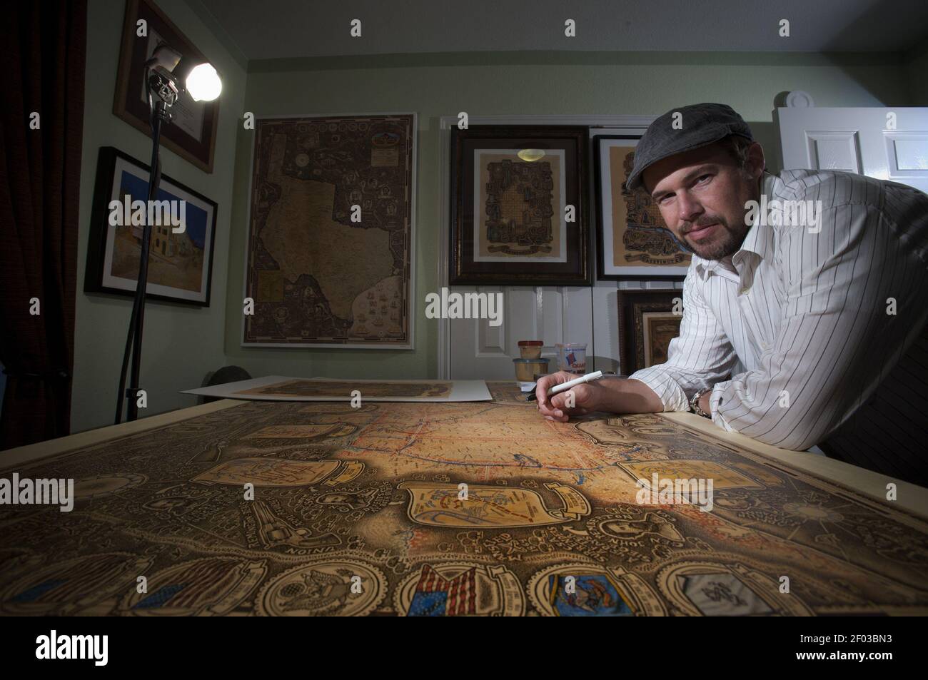 Map artist Christopher Smith poses for portrait in his Leander, Texas ...