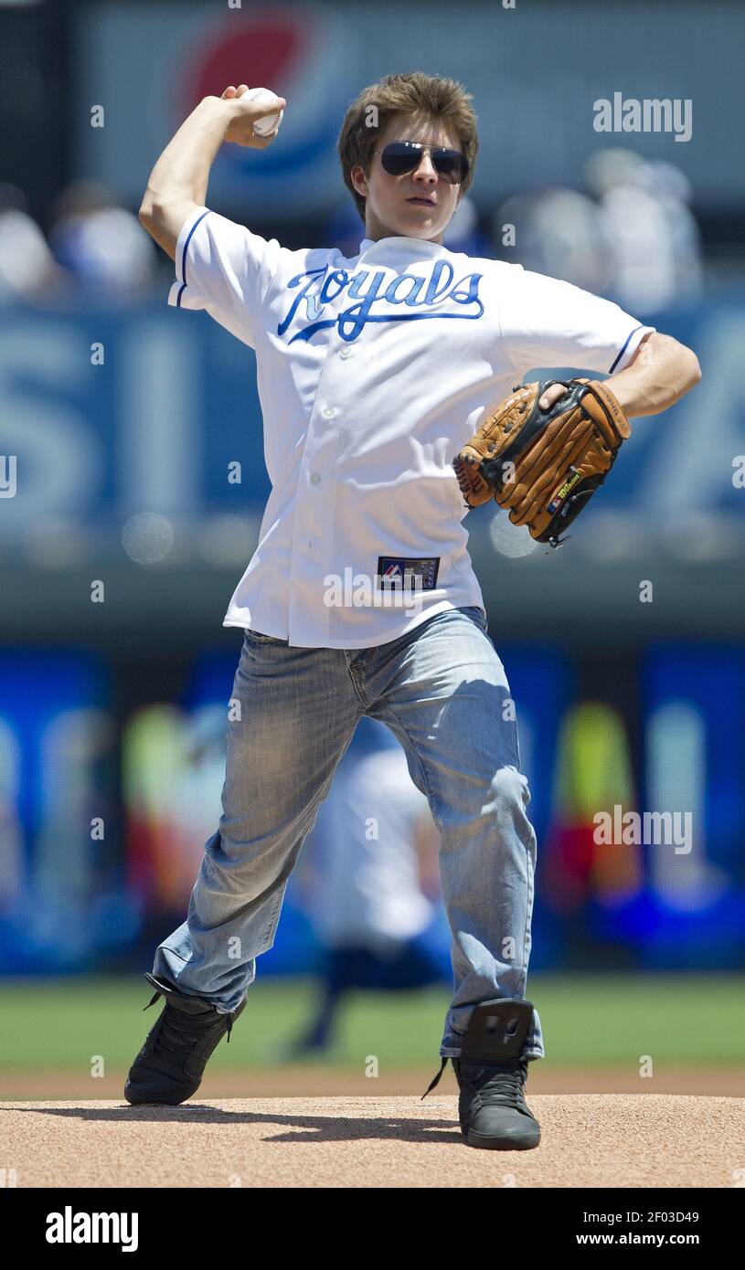 Actor Billy Unger throws out the first pitch before Sunday's baseball ...