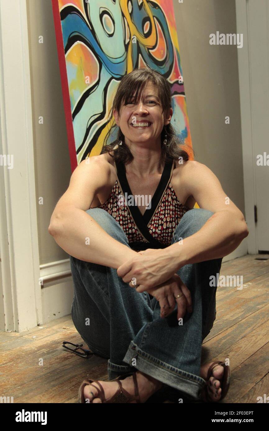 L.L. (Photo by Lisa) Samson poses for portrait by her painting, David's ...