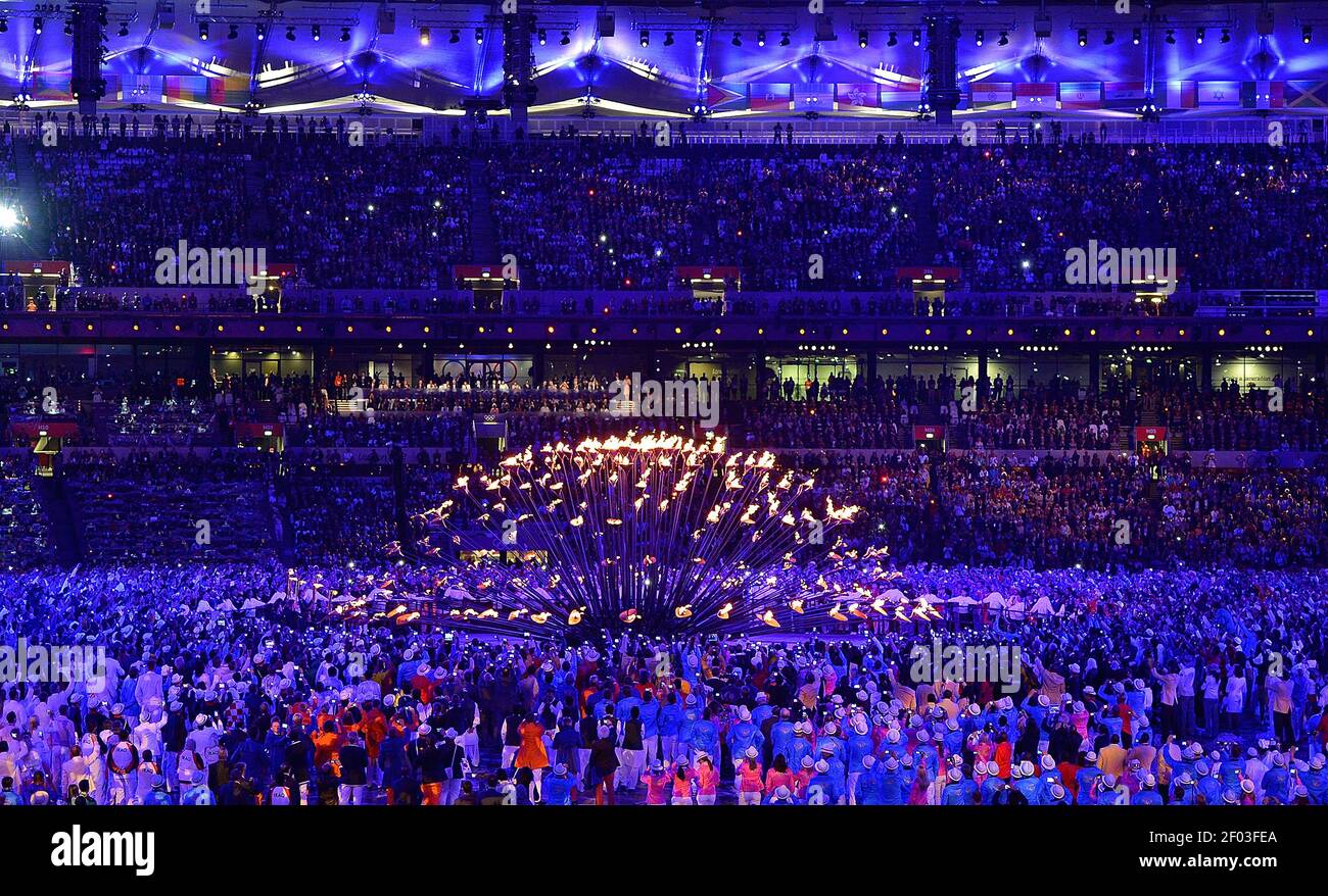 The Olympic cauldron forms in Olympic Stadium during the Opening ...