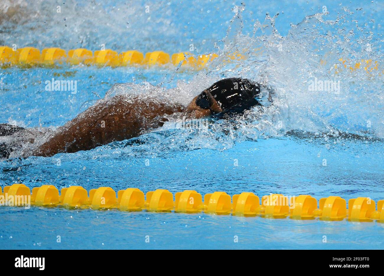 The USA's Cullen Jones swims the third leg of the Men's 4x100 Freestyle ...