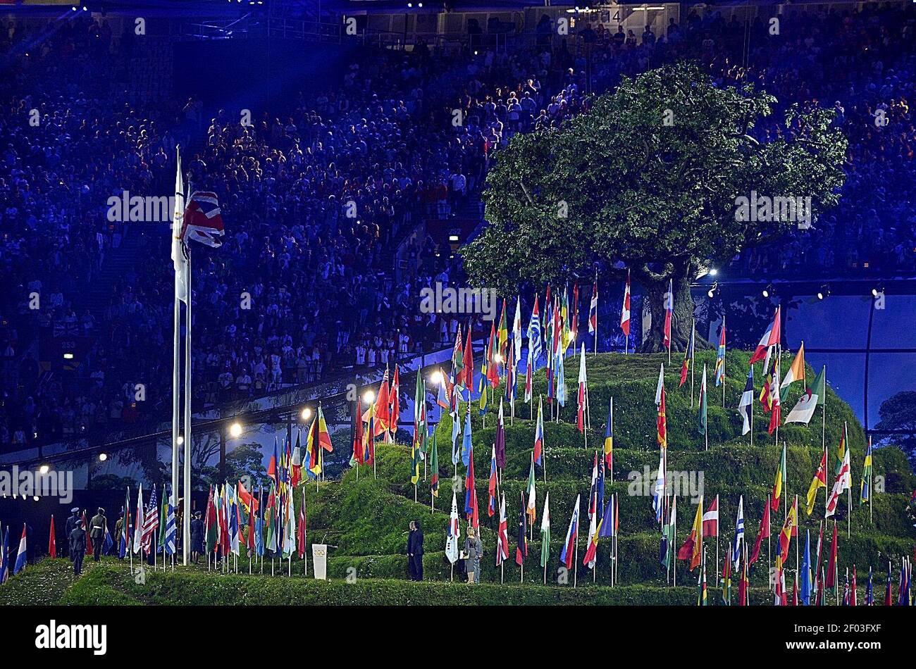 The Olympic flag is raised in Olympic Stadium during the Opening ...