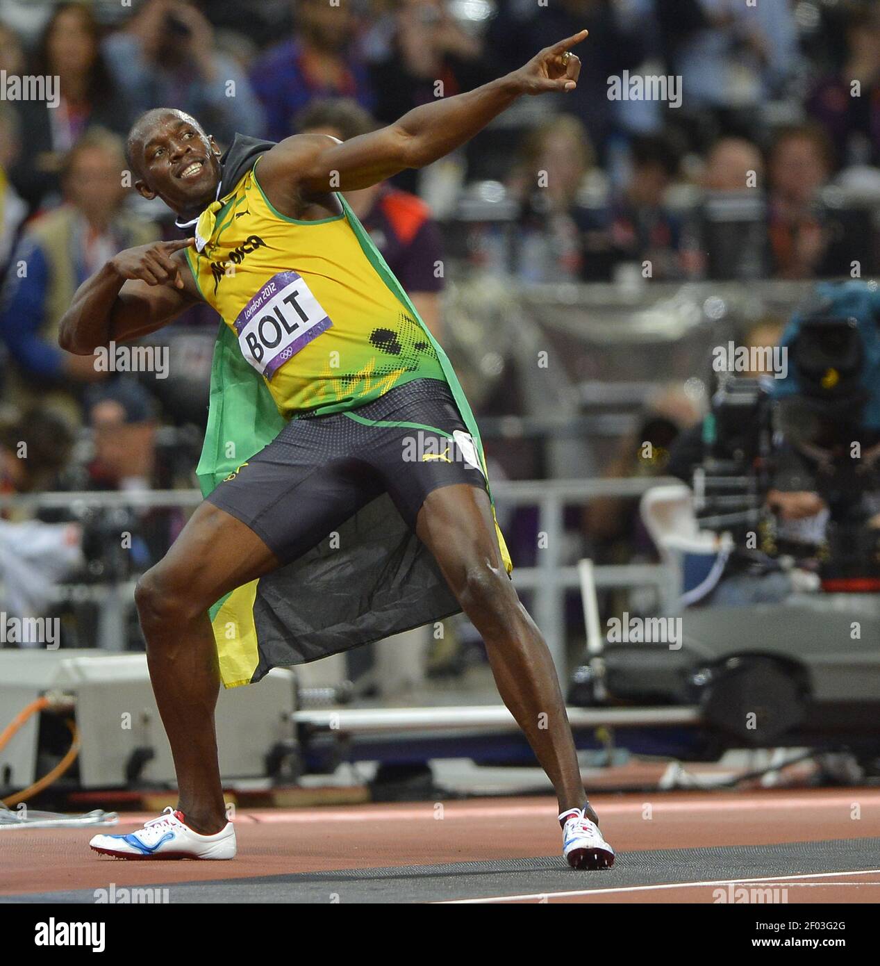 Usain Bolt of Jamaica strikes his lightning bolt pose as he celebrates ...