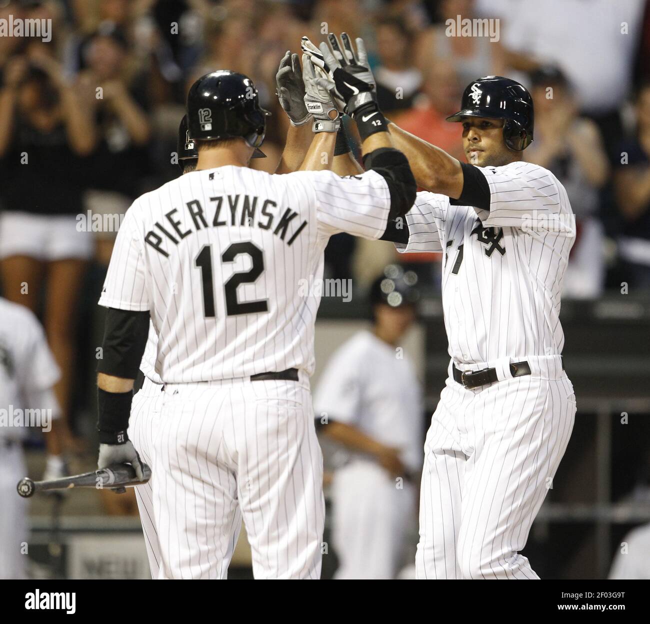 Chicago White Sox right fielder Alex Rios (51) is welcomed at home ...