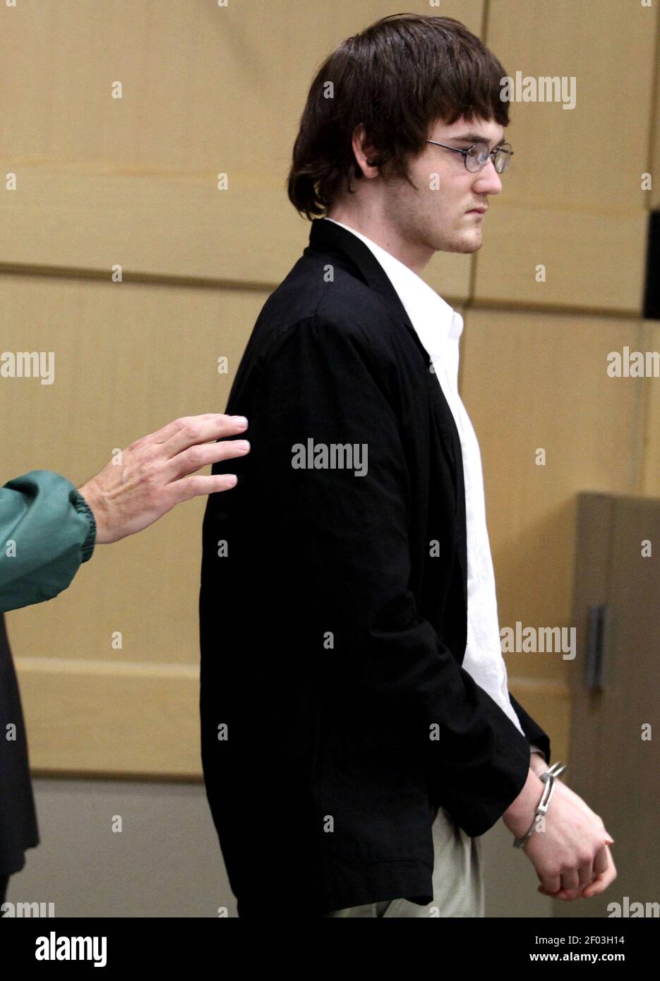 Wayne Treacy is lead away in handcuffs after a guilty verdict in his ...