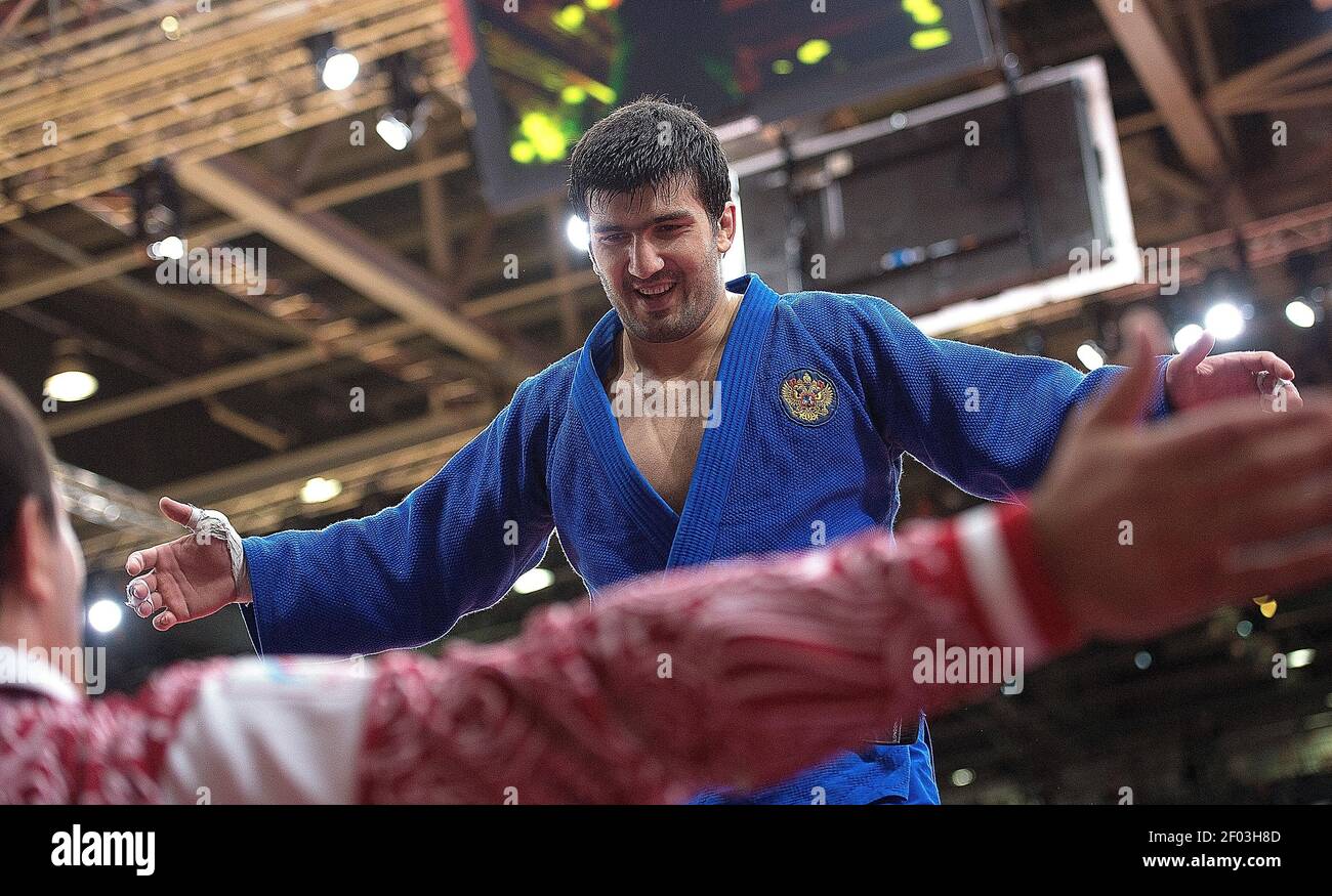 Russia's Tagir Khaibulaev hugs his coach after defeating Mongolia's ...
