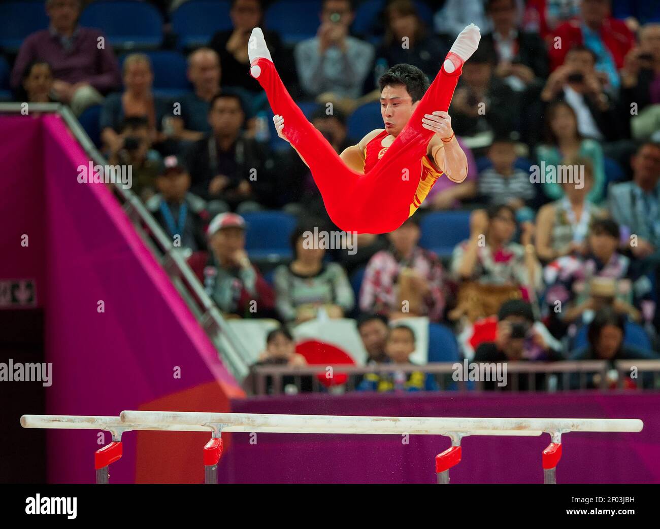 Zhe Feng of China won the gold medal in the men's parallel bar ...