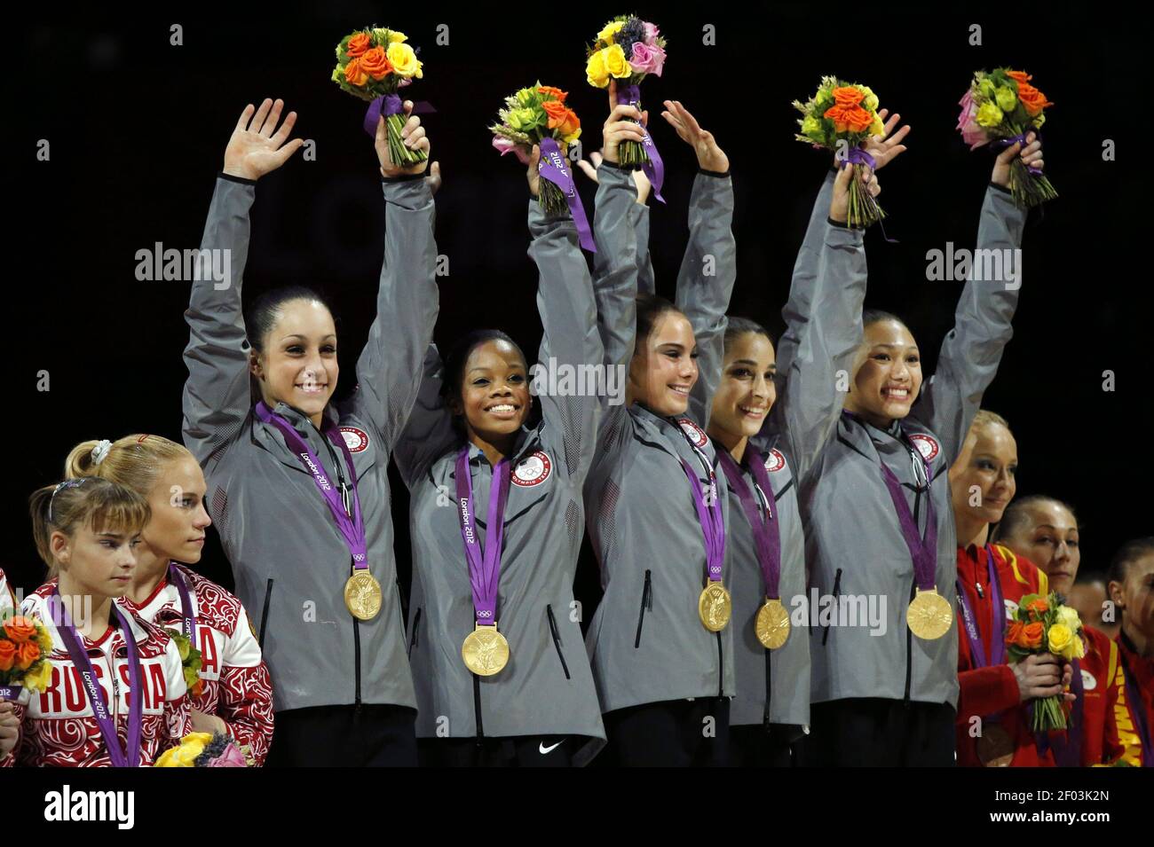 The United States women's gymnastics team, center podium, left to right ...