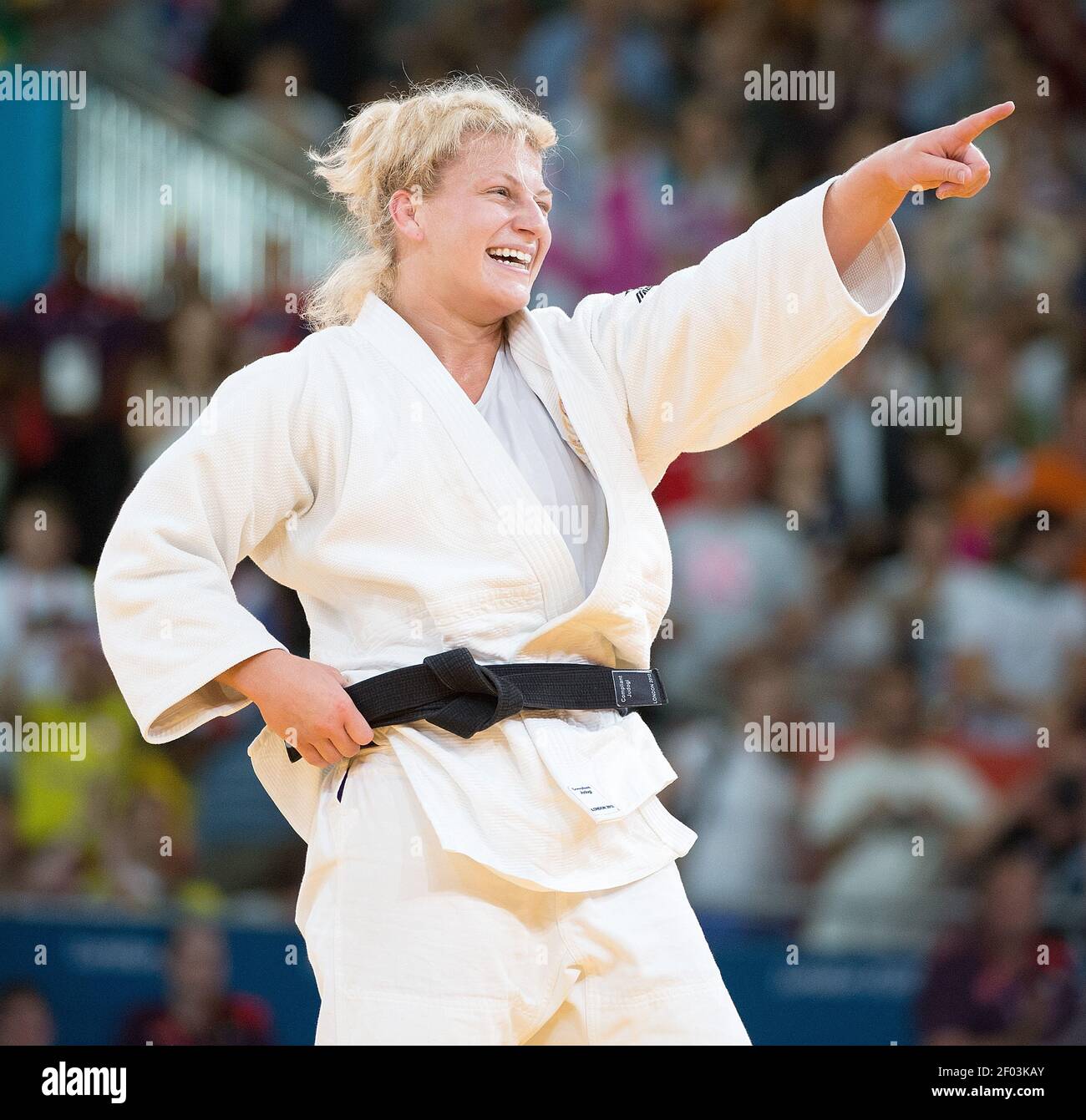 USA's Kayla Harrison celebrates her victory over Great Britain's Gemma ...