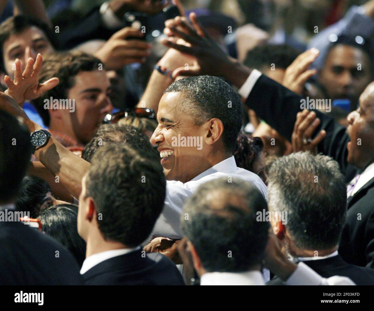 President Barack Obama reaches out to the crowd during a rally at the ...