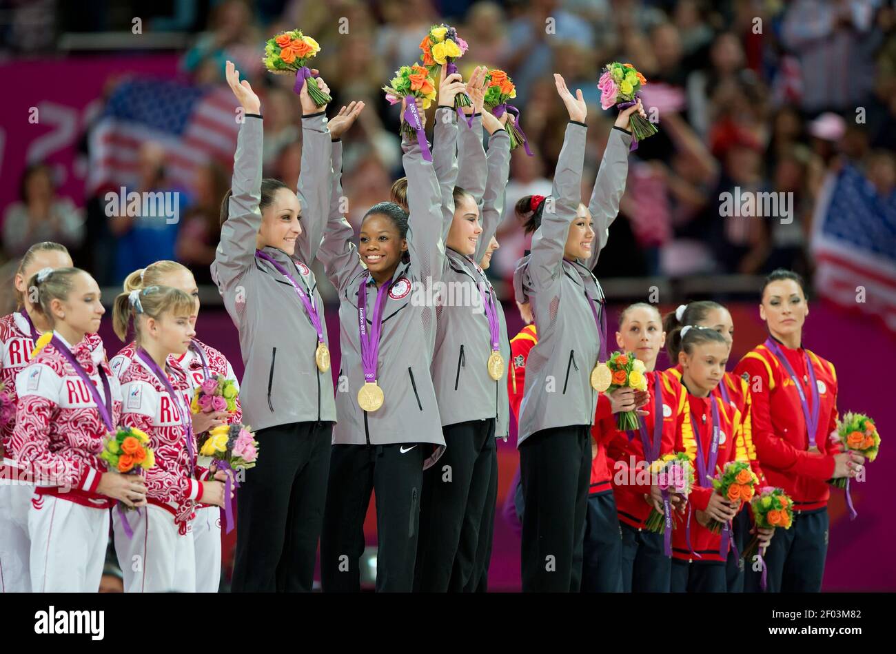 The United States women's gymnastics team of (center podium, left to ...
