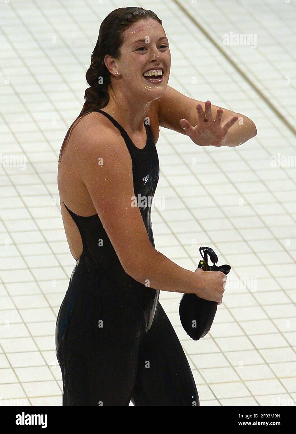 USA swimmer Allison Schmitt waves to supporters following her silver ...