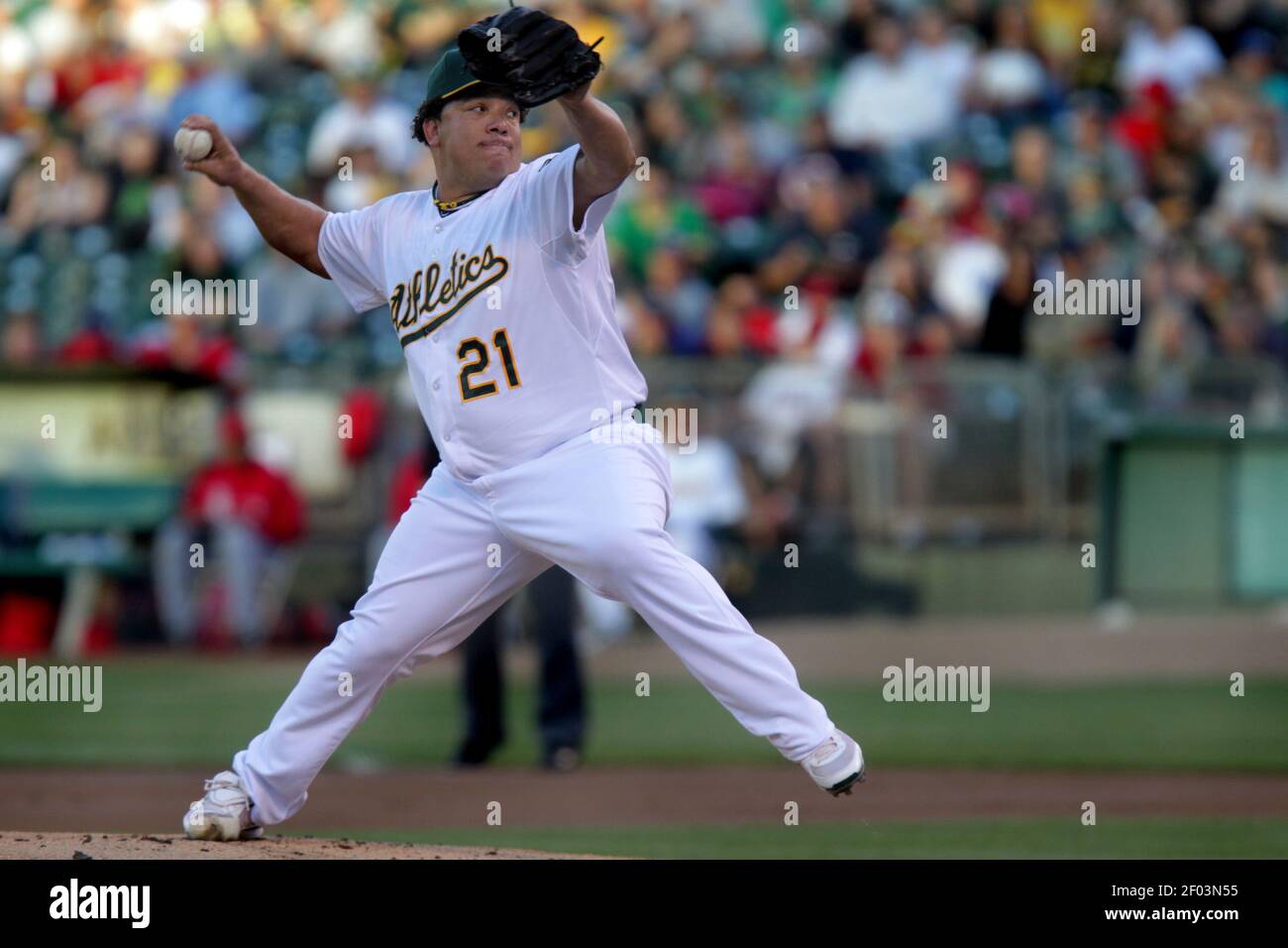 Oakland Athletics starting pitcher Bartolo Colon delivers against Los ...
