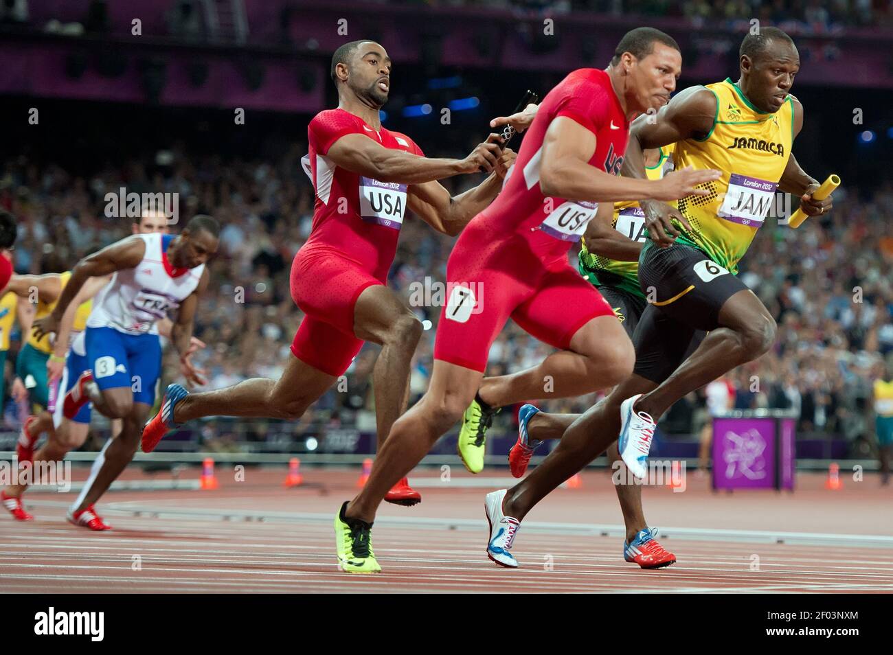 Jamaica's Usain Bolt, right, took the baton on the last leg of the men's 4X100m relay final ...