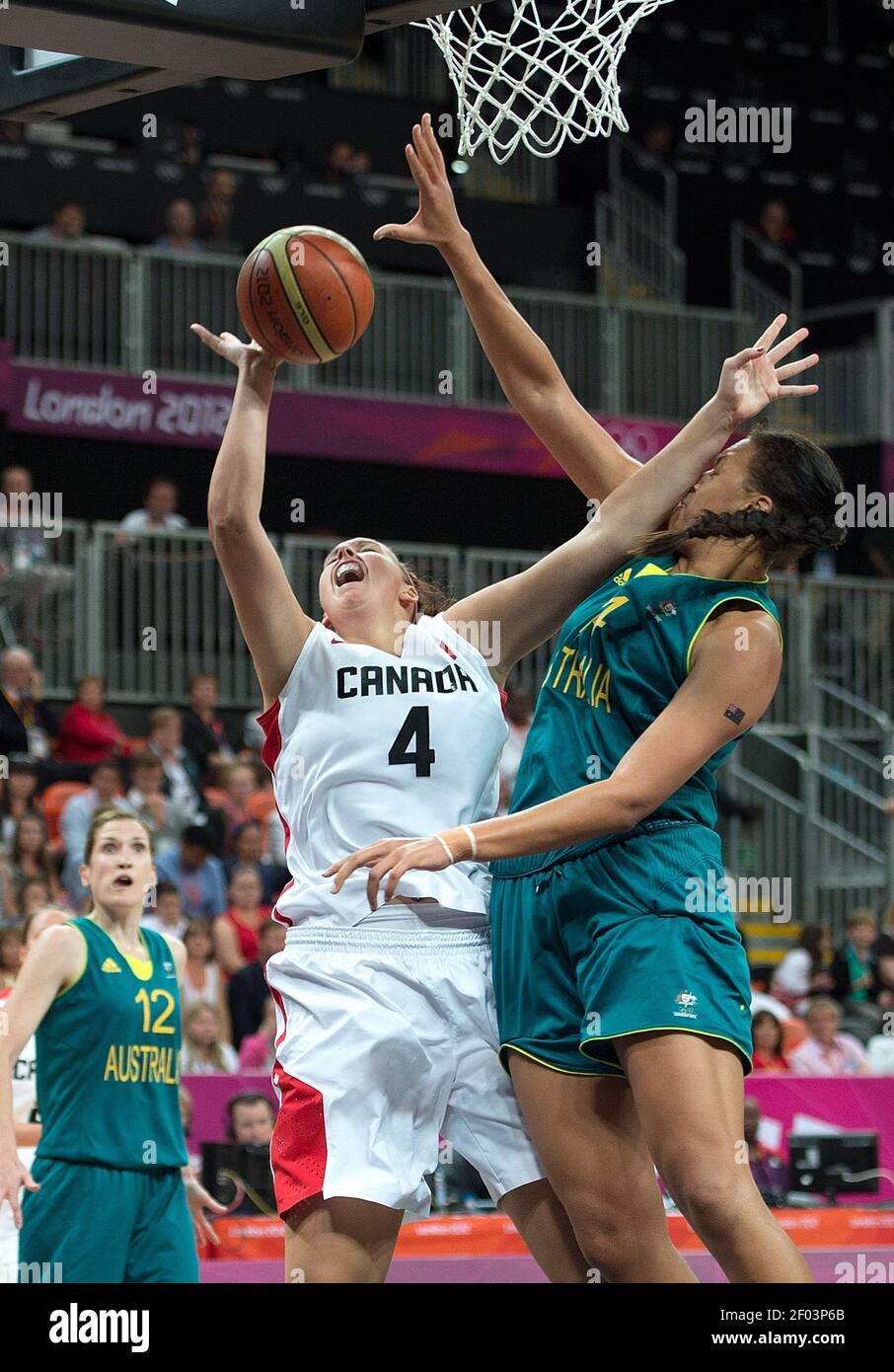 Canada's Krista Phillips (4) shot is blocked by Australia's Elizabeth ...