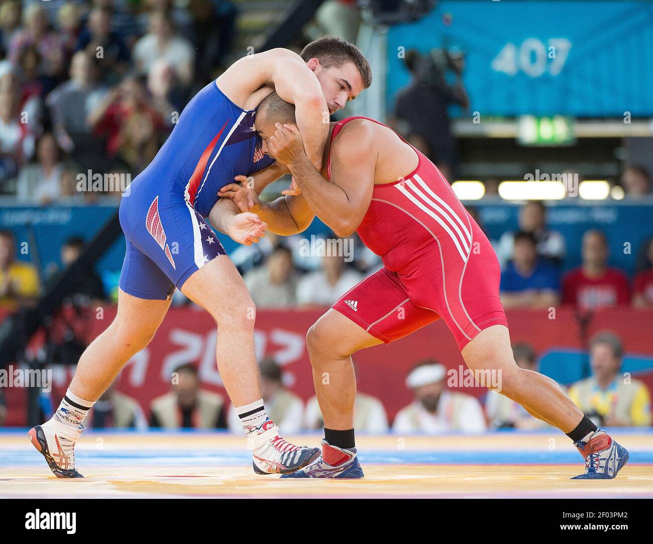 USA's Charles Betts (blue) wrestles Federated State of Micronesia's ...
