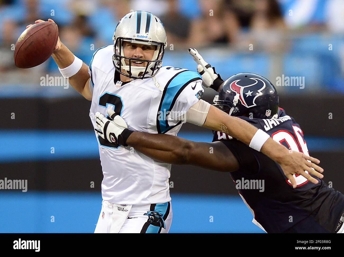 Carolina Panthers quarterback Derek Anderson scrambles away from ...