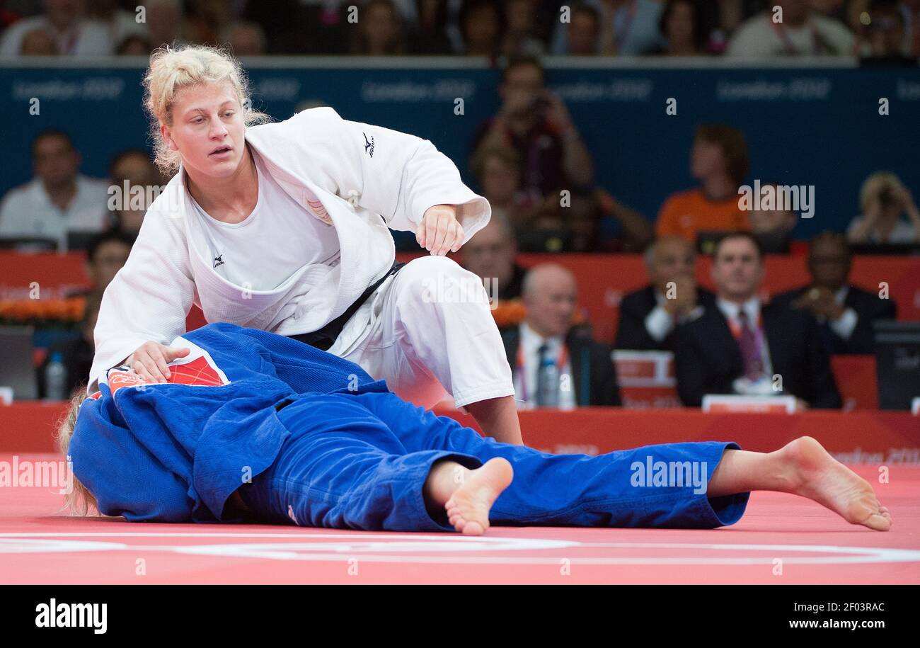 USA's Kayla Harrison (white) competes with Great Britain's Gemma ...