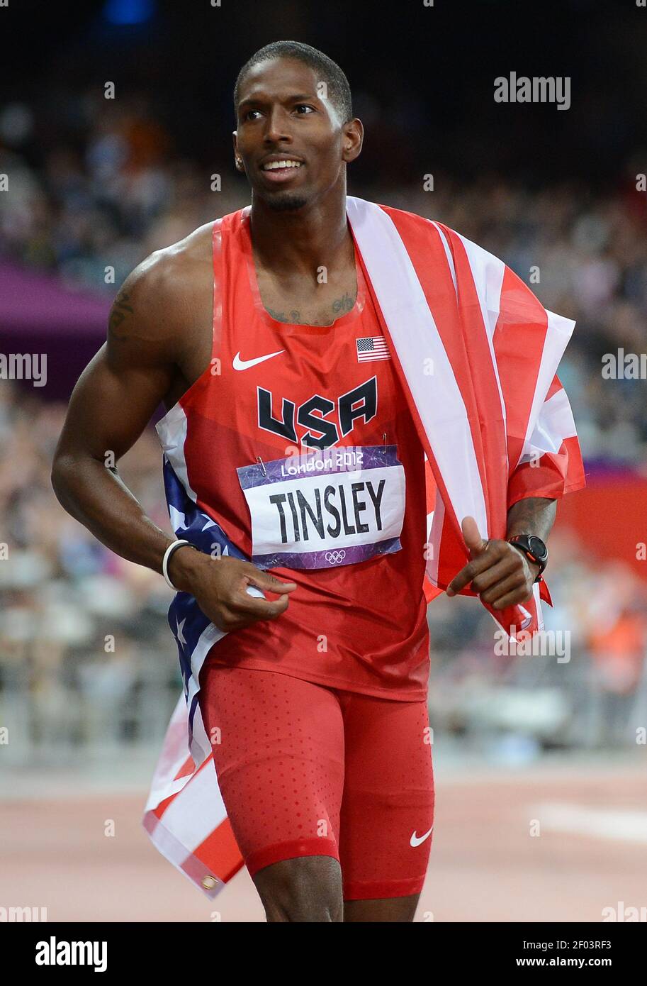 Michael Tinsley of the USA celebrates on the track following his silver ...