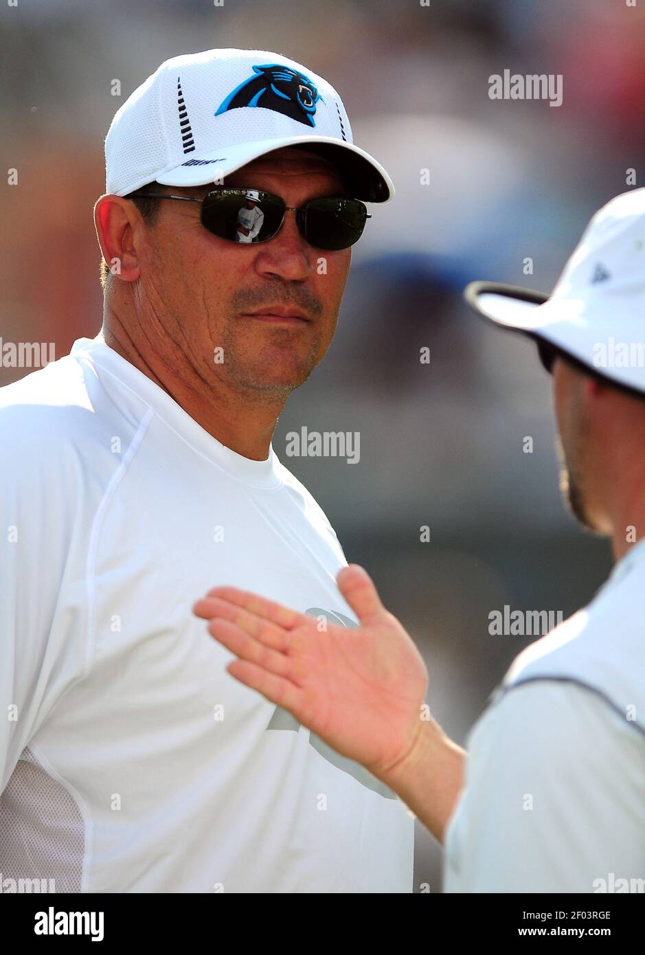 Carolina Panthers head coach Ron Rivera, left, and assistant wide ...