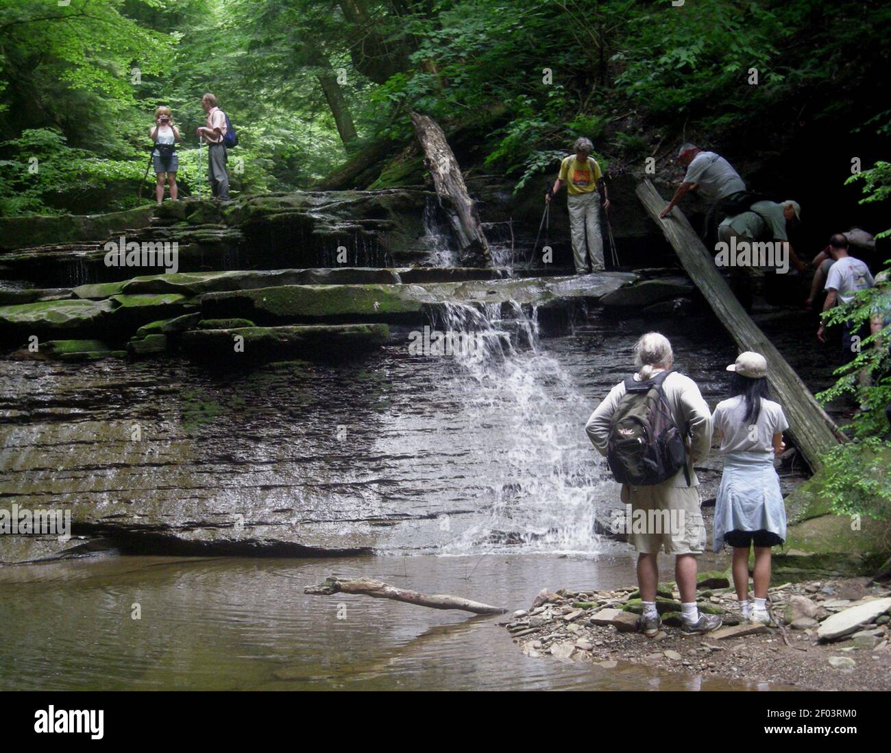 Hikers climb around Big Falls, a 20-foot tall waterfall in Stebbins ...