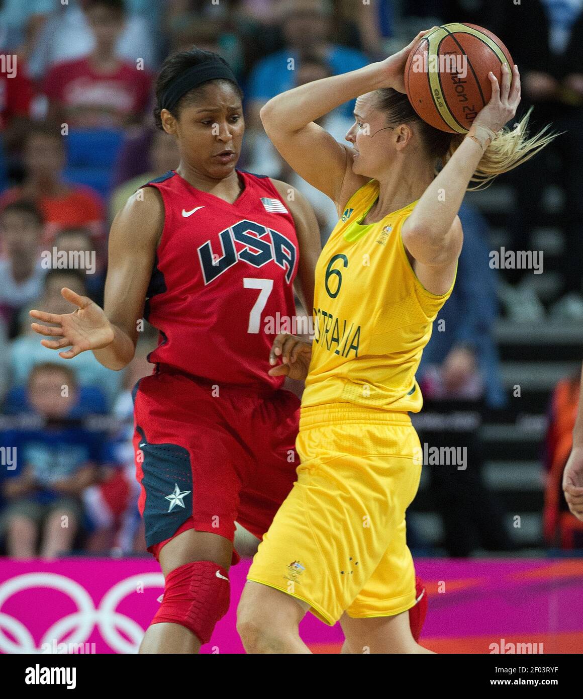 Australia's Jennifer Screen (6) is guarded closely by USA's Maya Moore ...