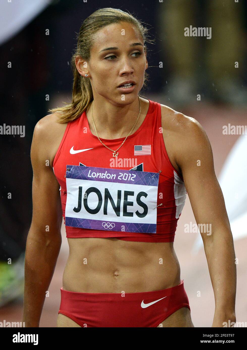 The USA's Lolo Jones walks through the media area inside Olympic ...