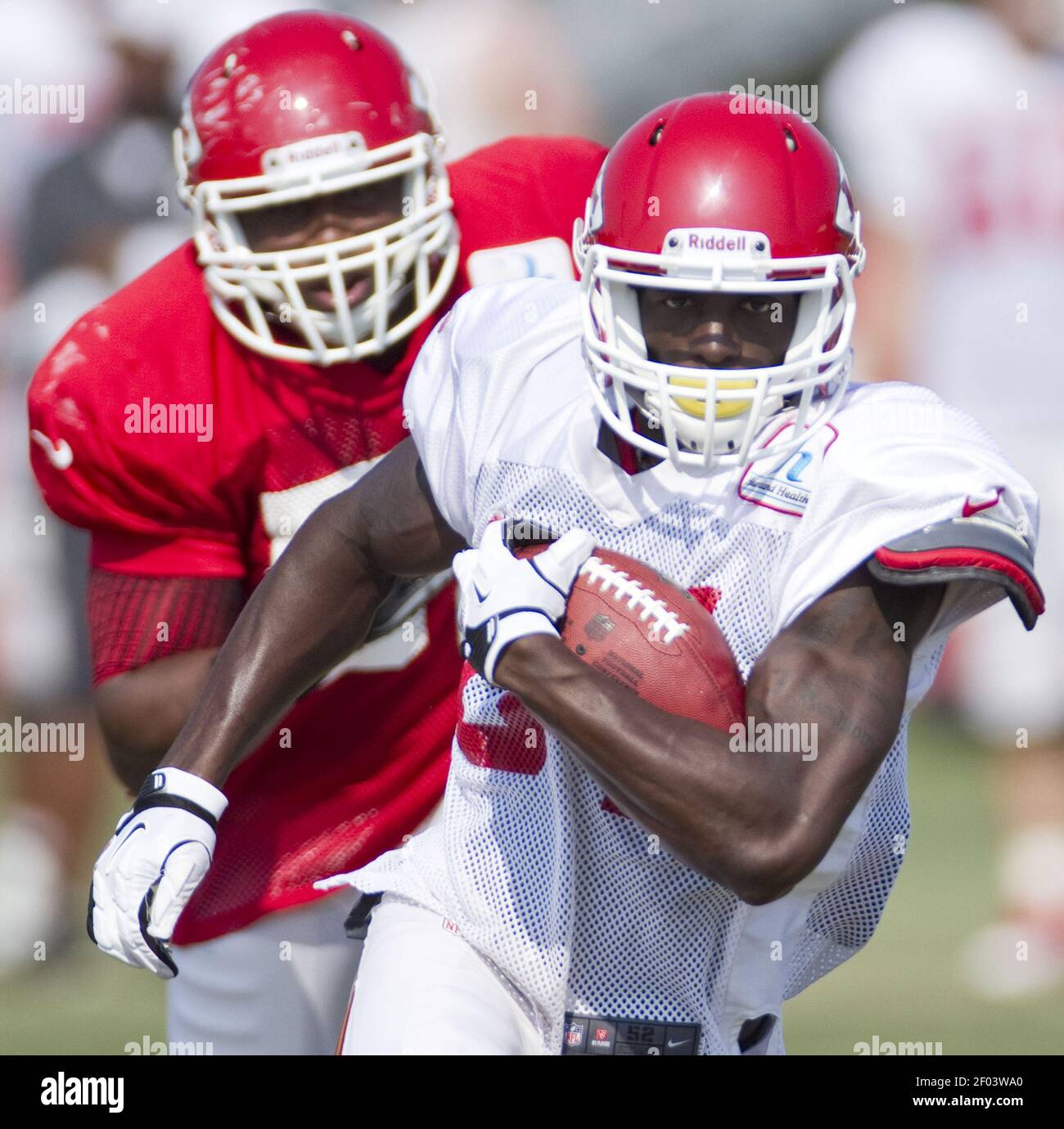 Kansas City Chiefs wide receiver Jamar Newsome, right, runs away from ...
