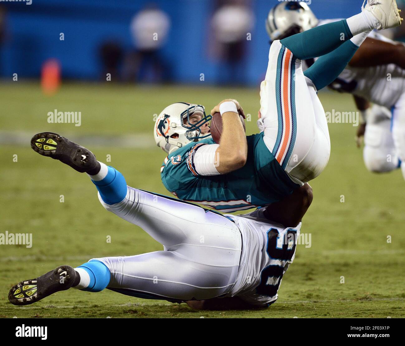 Carolina Panthers defensive end Frank Alexander (90) sacks Miami ...