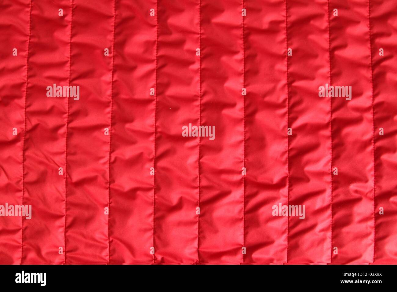 Red quilted fabric hi-res stock photography and images - Alamy
