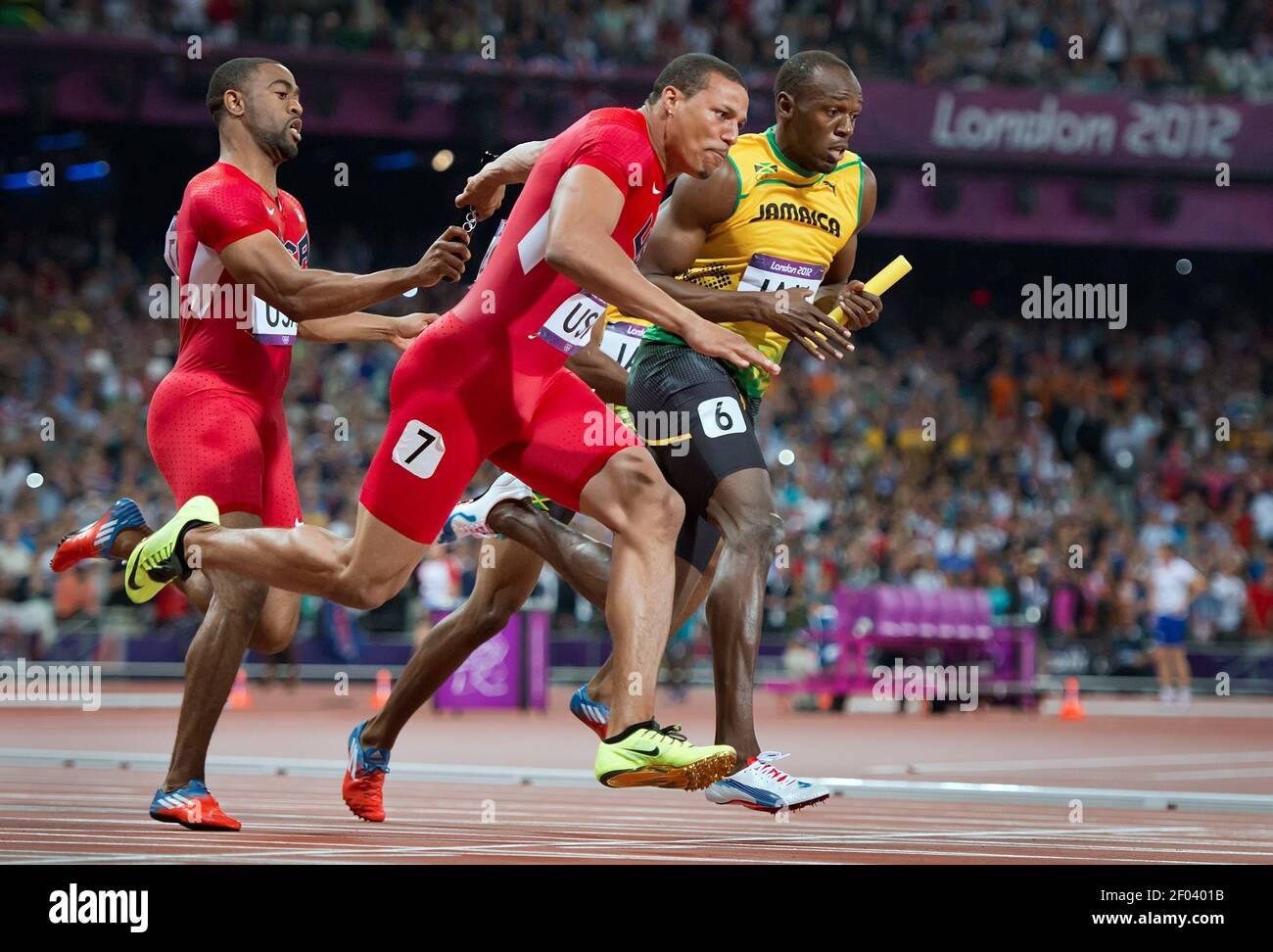 Jamaica's Usain Bolt, right, took the baton on the last leg of the men ...